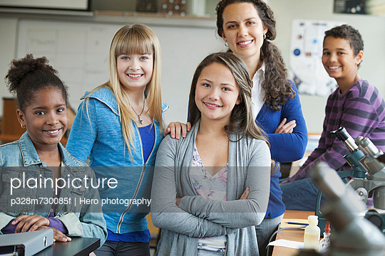 Teacher with middle school students. - Stock Image - Everypixel