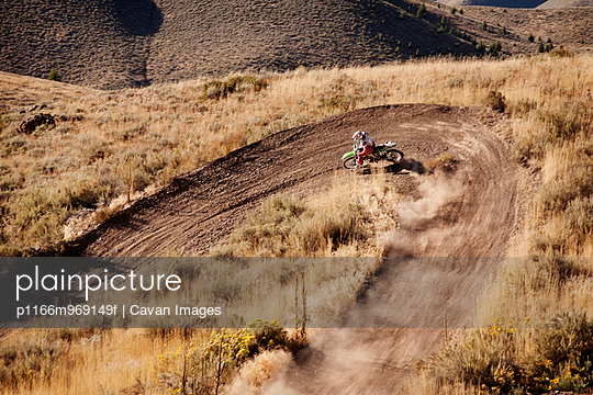 Person Riding Dirk Bike Around Track - Stock Image - Everypixel