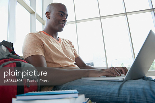 Student using laptop - Stock Image - Everypixel