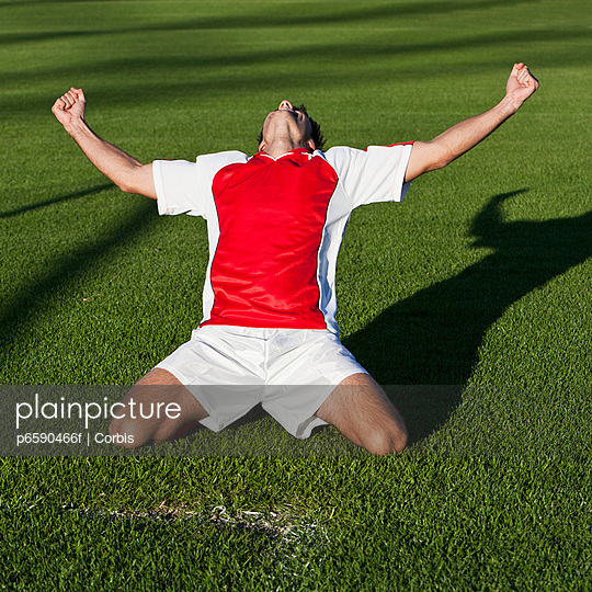 Soccer player celebrating a goal - Stock Image - Everypixel