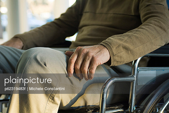 Handicapped person in wheelchair - Stock Image - Everypixel
