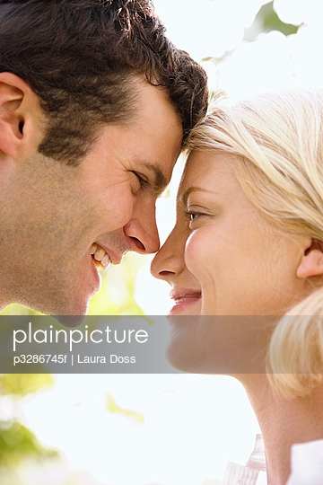 Affectionate couple nuzzling - Stock Image - Everypixel