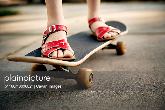 Close up Of Feet On Skateboard - Stock Image - Everypixel