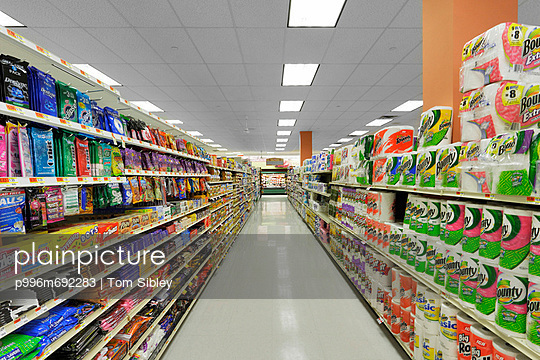 Candy And Paper Towels In Supermarket Aisle - Stock Image - Everypixel